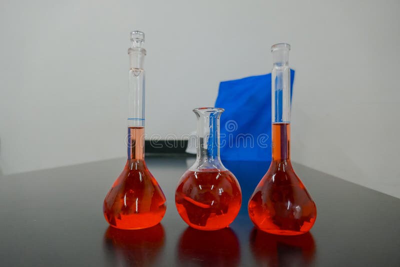 Pharmacy Laboratory and Chemistry Theme. Test Glass Flask with Liquid ...