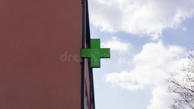 Pharmacy Logo on a Building Side Stock Image - Image of building ...