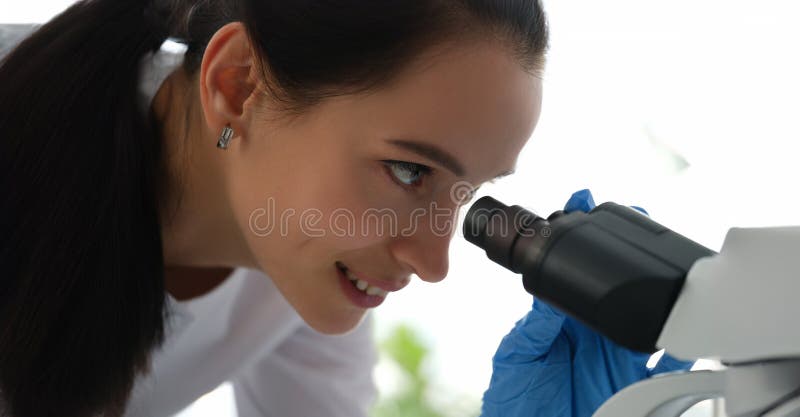 Pharmacy Scientist Working with Professional Microscope in Technology ...