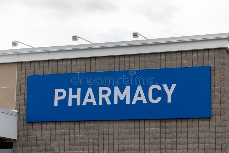 Pharmacy Sign on a Building Stock Photo - Image of exterior, wall ...