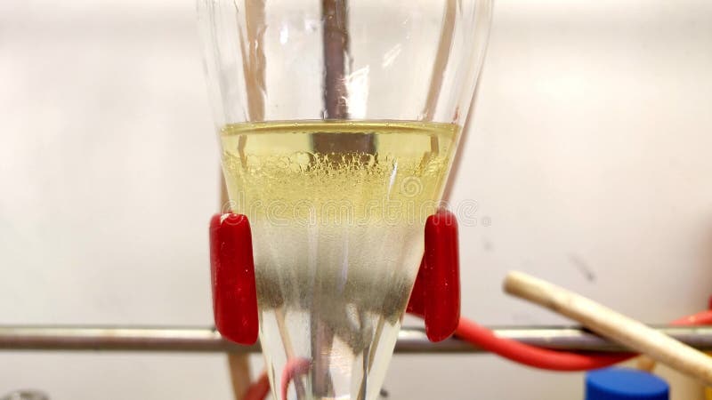 Separation of Organic Layer and Water Layer in Separating Funnel in a ...