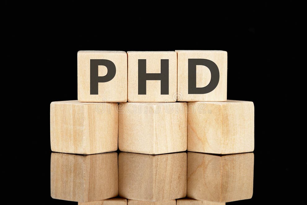 PHD Text Assembled from Wooden Cubes on a Black Background Stock Photo ...