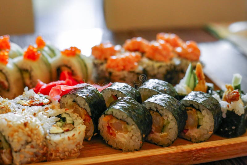 Philadelphia Roll Set on a Wooden Board in a Restaurant Stock Photo ...