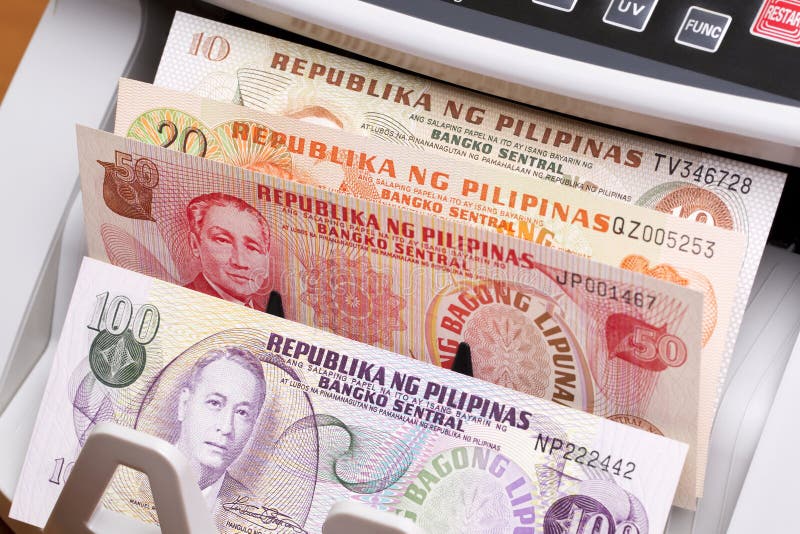Philippine Peso in the Counting Machine Stock Photo - Image of ...