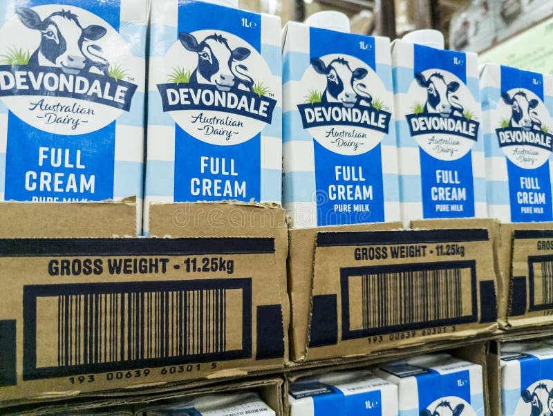 Philippines -Rows of Devondale Full Cream Milk Cartons in Cardboard ...