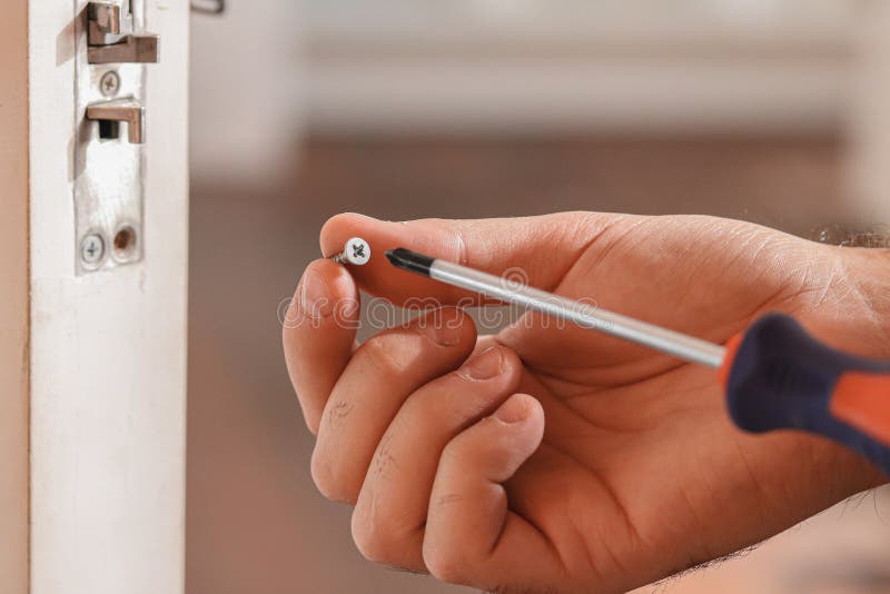 Philips Screwdriver Tightening in Door Stock Image - Image of lock ...