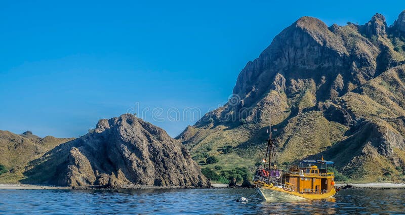 Phinisi Ship on Padar Island Stock Image - Image of boating, terrain ...