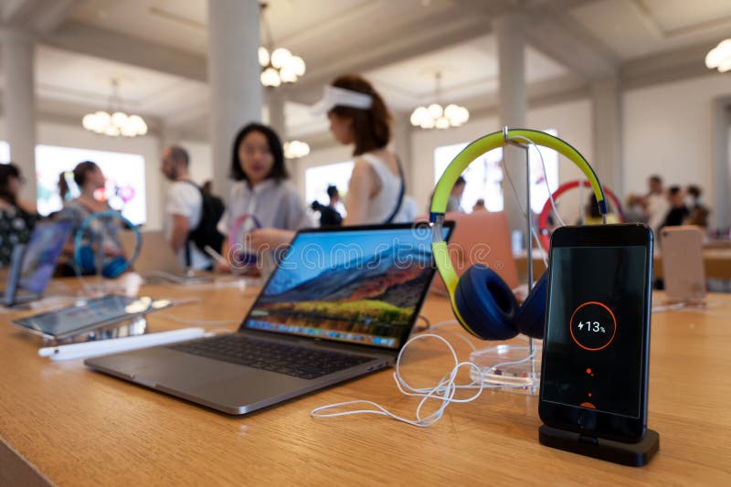 Notebook, Headphone and Smartphone at the Computer Store. Editorial ...