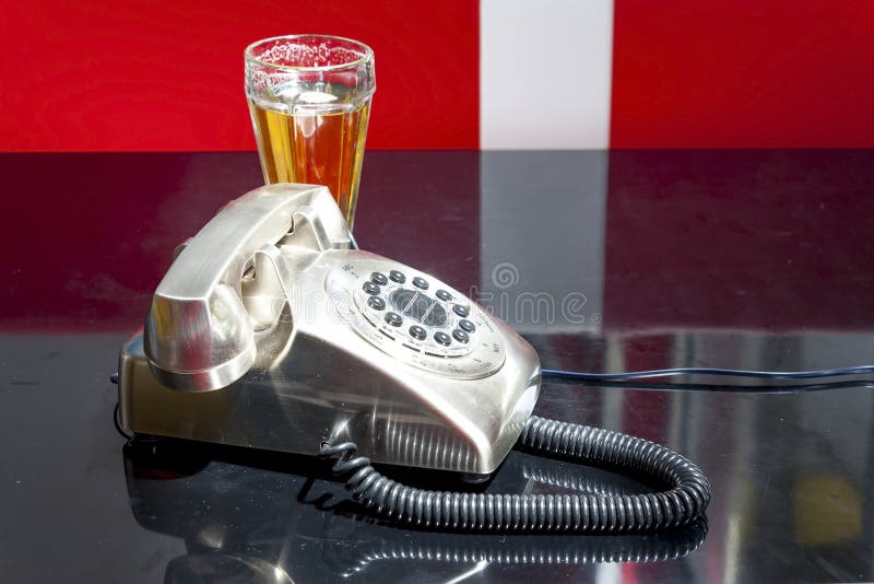 Phone and beer in a bar stock image. Image of closeup - 42334443