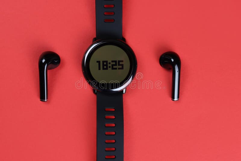 Phone and Bluetooth Wireless Headphones on Red Background Stock Image ...