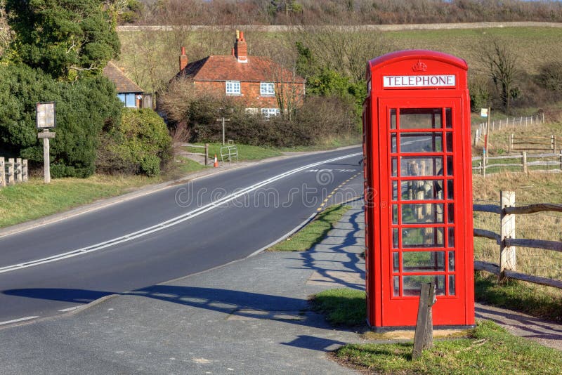 Red phone box at a road stock image. Image of next, england - 5044439