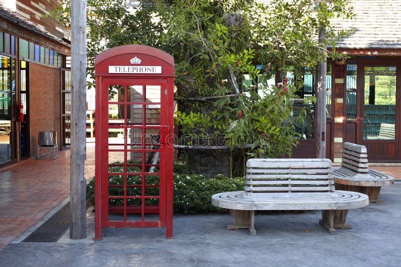 Phone Booth and Wooden Chair Stock Photo - Image of english, england ...