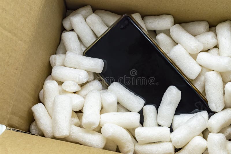 Phone in a Box in Foam Sticks Top View Stock Photo - Image of copyspace ...