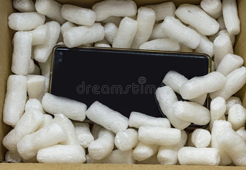 Phone in a Box in Foam Sticks Top View Stock Photo - Image of home ...