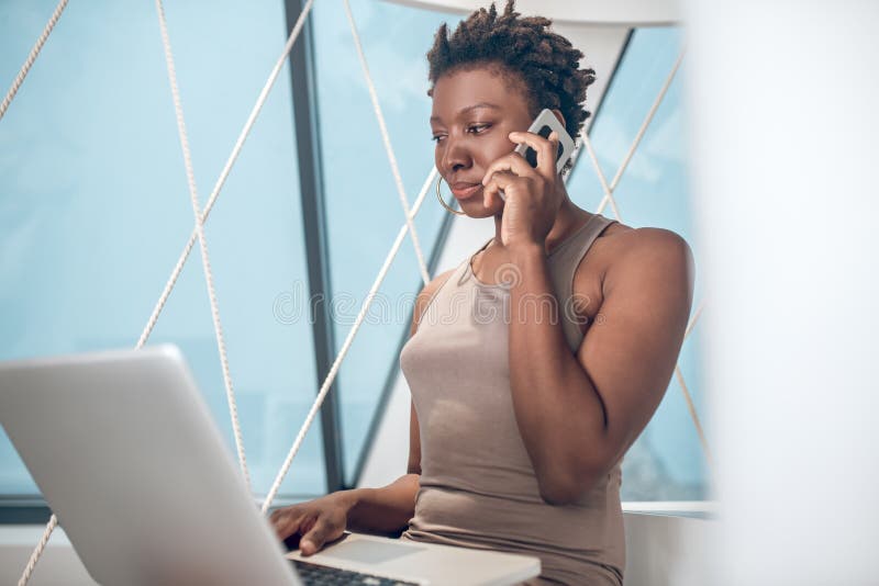 Confident Young Woman Talking on the Phone Stock Photo - Image of ...