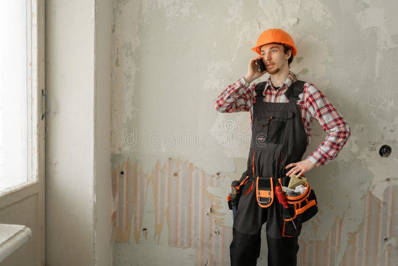 Phone Call and Construction Site Concept. Builder Man Talking for ...