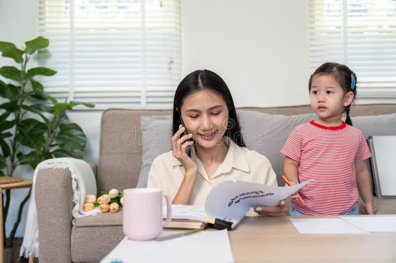 Phone Call Multitasking: Mom and Daughter Sharing Quality Time Stock ...