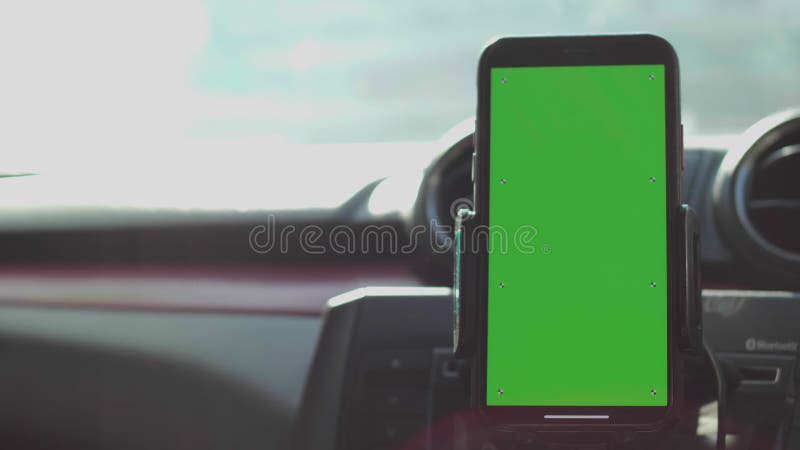 Phone on Car Dashboard Green Screen, Smartphone with a Green Screen ...