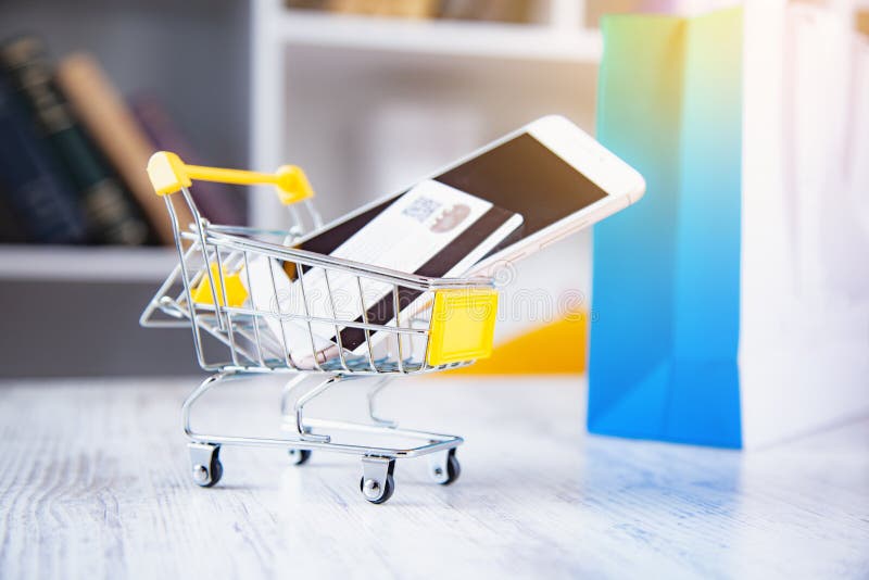 Phone with Card on Basket on Table Stock Image - Image of digital ...