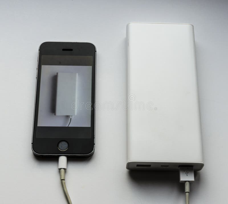 Phone is Charging from the Power Bank of Large Capacity, Fast Charging ...
