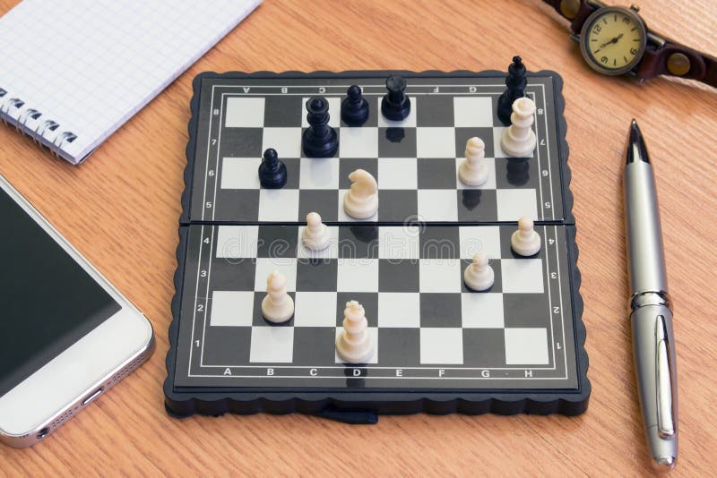 Phone Chess Clock and Notebook on the Table Stock Image - Image of ...