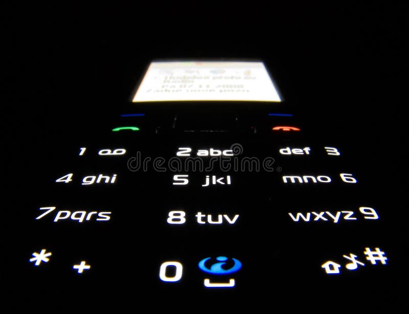 Phone in dark stock photo. Image of blue, isolated, keyboard - 7000768