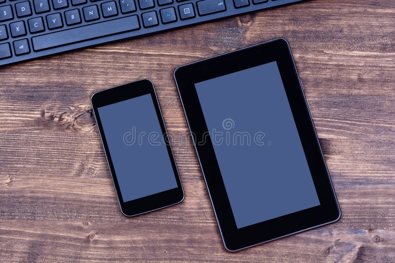 Phone with Digital Tablet and Keyboard Computer on Table Stock Image ...