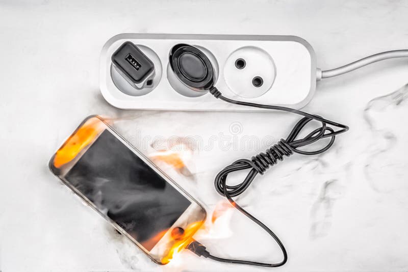 Phone on Fire Connected To the Power Supply Stock Photo - Image of ...