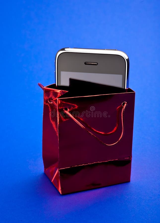 Phone in gift packet stock photo. Image of design, gift - 11653172
