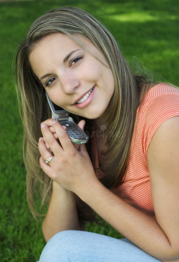 Two Girls Using Mobile Phones Stock Photo - Image of listening ...
