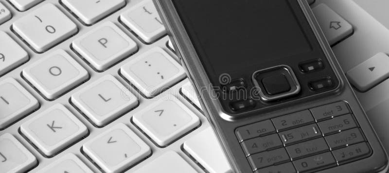Phone on keyboard stock image. Image of phone, office - 13357889
