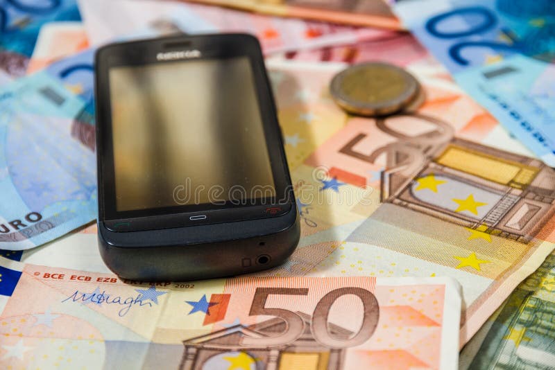 Phone and money stock image. Image of cell, currency - 45011461