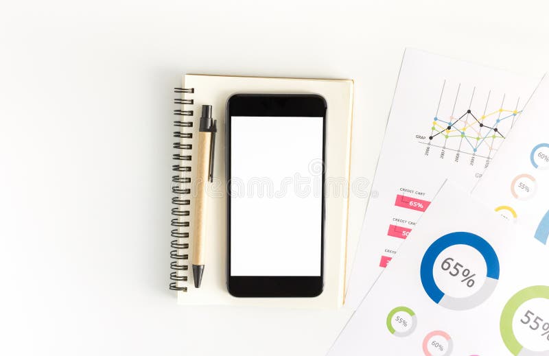 Phone and Notebook, Paper Graph on White Table Stock Image - Image of ...
