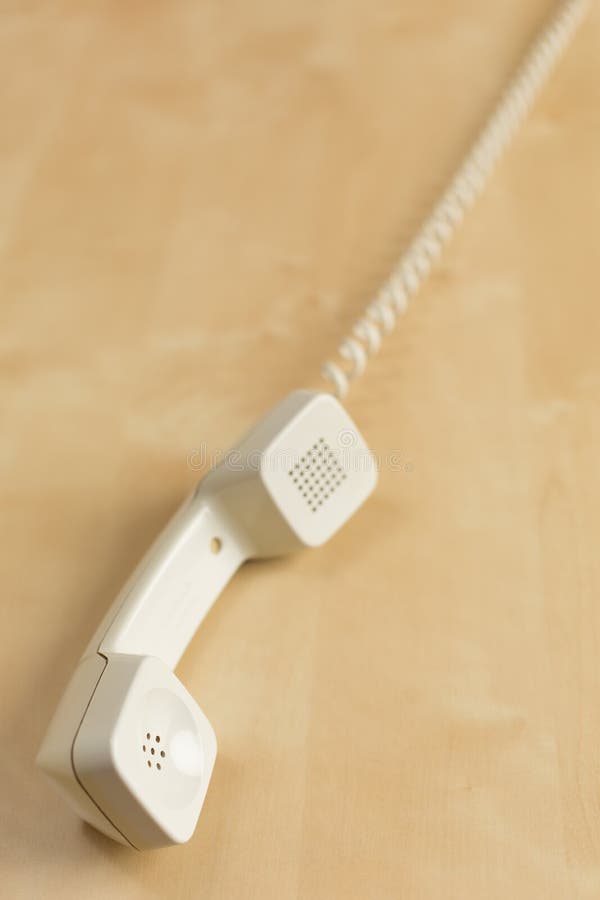Phone Receiver Laying on the Desk Stock Photo - Image of desktop, lone ...