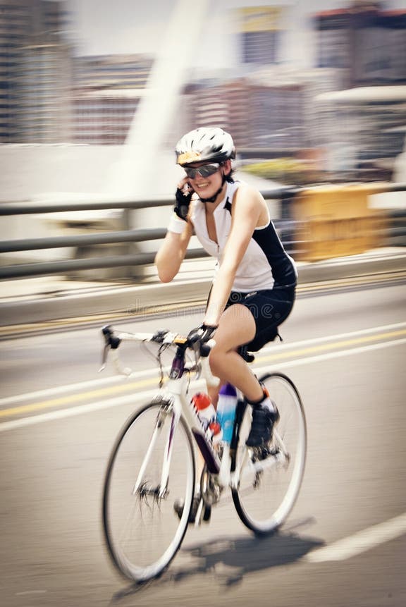 On the Phone, while Riding editorial photo. Image of race - 17484281