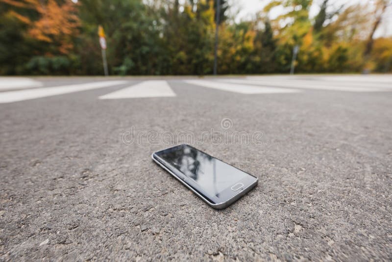 Phone on the road stock photo. Image of pavement, crossing - 171983826