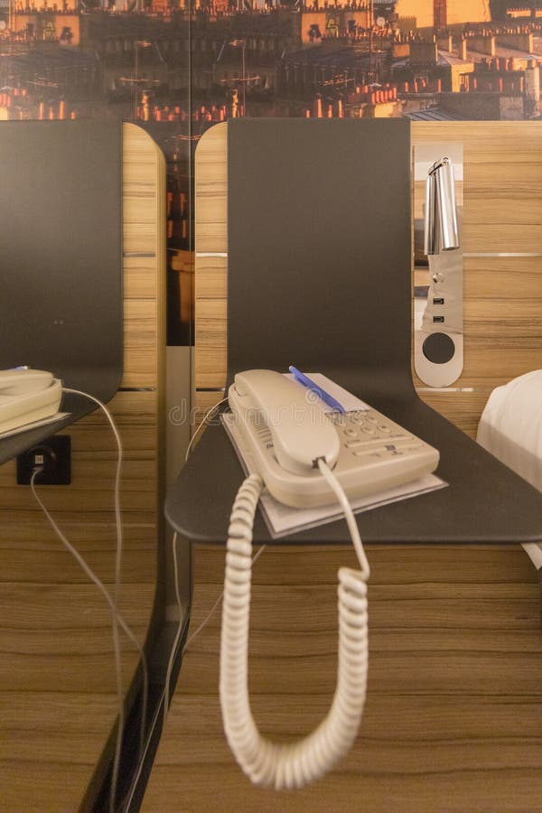 Phone on the Side of the Bed in an Hotel Room Stock Photo - Image of ...