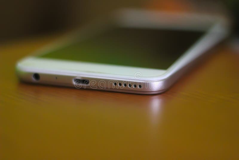 Phone Side View on the Brown Table Stock Image - Image of concept ...