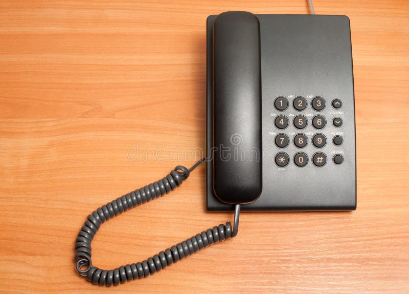 Phone on a table stock image. Image of keypad, table - 11638625