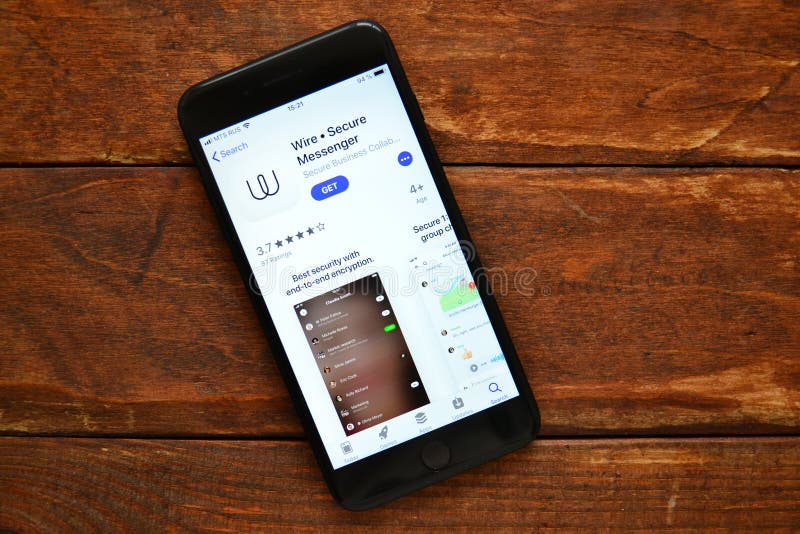 Phone on the Table with a Mobile Application To Send a Message ...