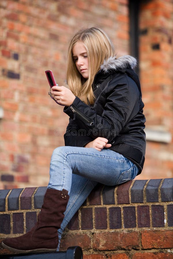 Phone user stock photo. Image of teens, hair, urban, blond - 6935924