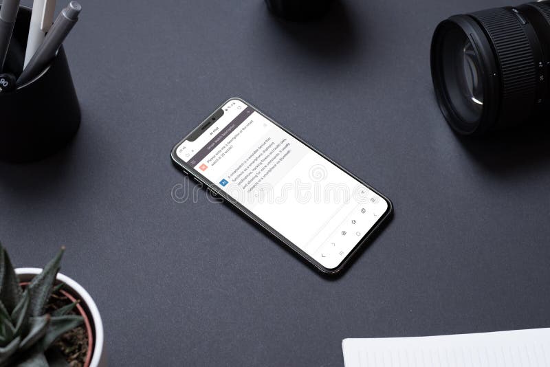 Phone on Work Desk with AI Chat App. Chatbot Auto-generative System Use ... Phone on Work Desk with AI Chat App. Chatbot Auto-generative System Use ...