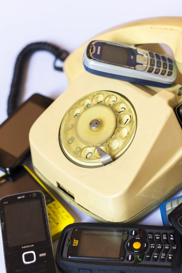 Old and Broken Mobile Phones on a White Background Editorial Stock ...