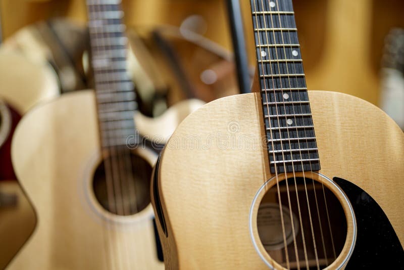 Photo of Acoustic Guitars in a Store Stock Image - Image of wooden ...