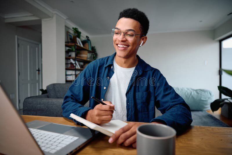 Photo of a African American Guy Taking Notes in His Notebook Stock ...