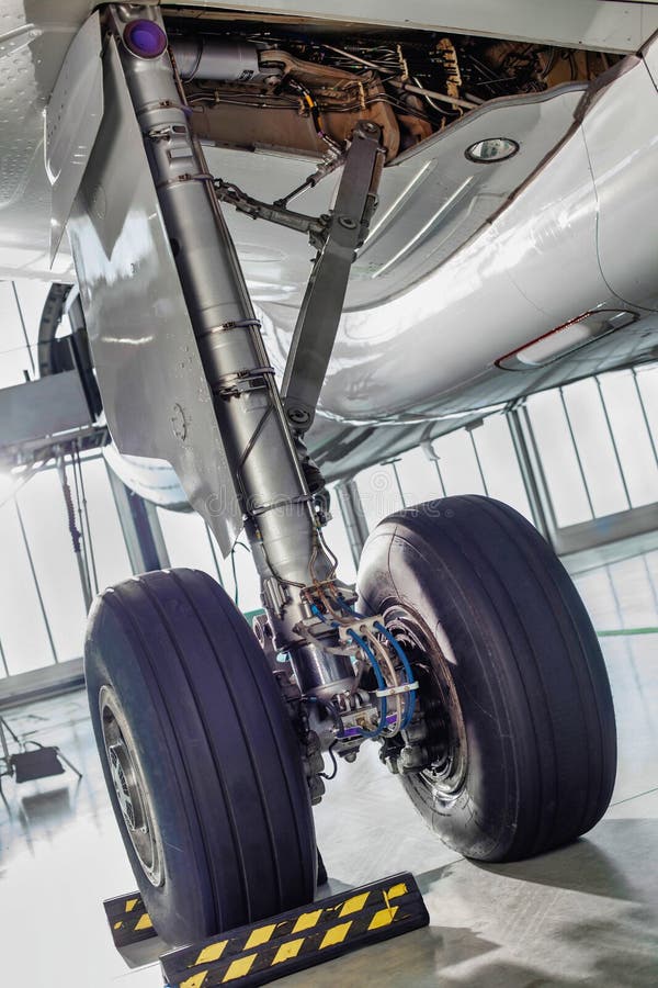 Photo of Airplane Wheels in Airport Stock Image - Image of board ...