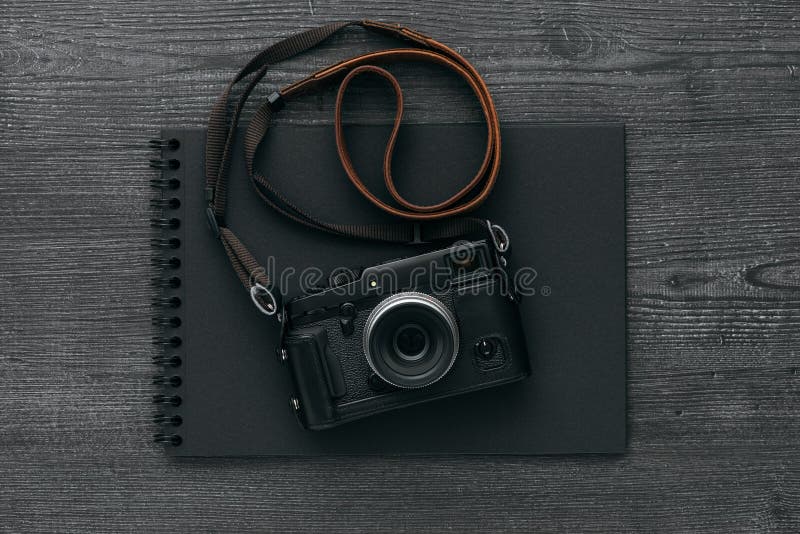Photo album with camera stock image. Image of notepad - 81693195