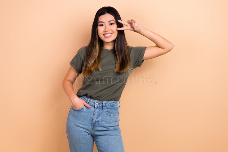 Photo Of Attractive Asian Nationality Lady Showing V Sign Near Eyes