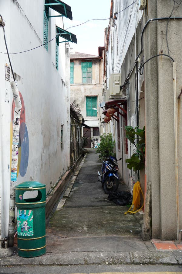 A photo of a back alley editorial stock image. Image of architecture ...