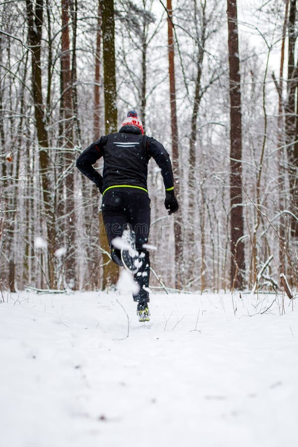 Photo from Back of Running Man in Sneakers Stock Photo - Image of ...